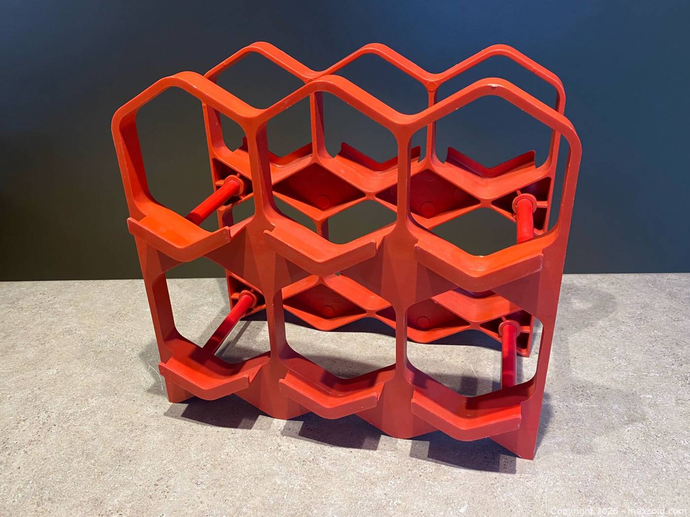 A.J. Industri red modular plastic wine rack | Maxsold