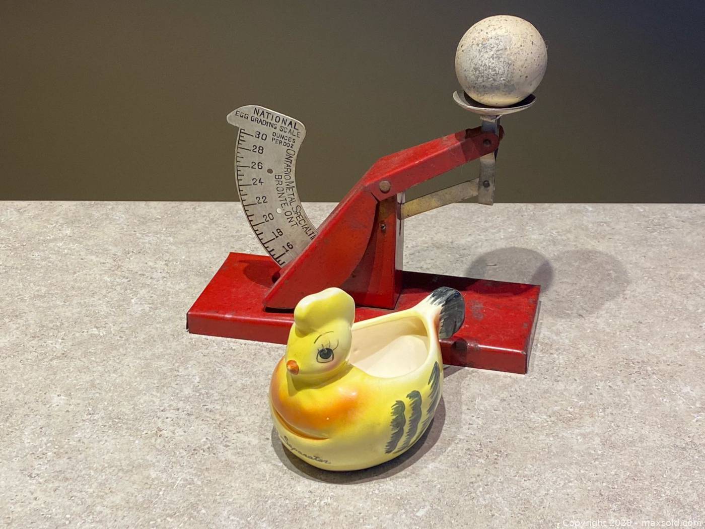 National egg scale, ceramic chick separator, speckled display egg | Maxsold