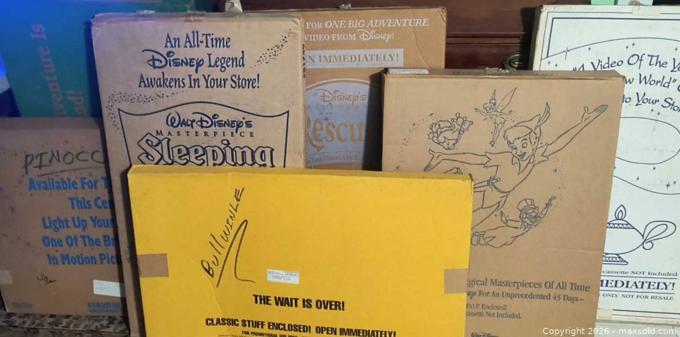 7 Disney cardboard video-store displays | Maxsold