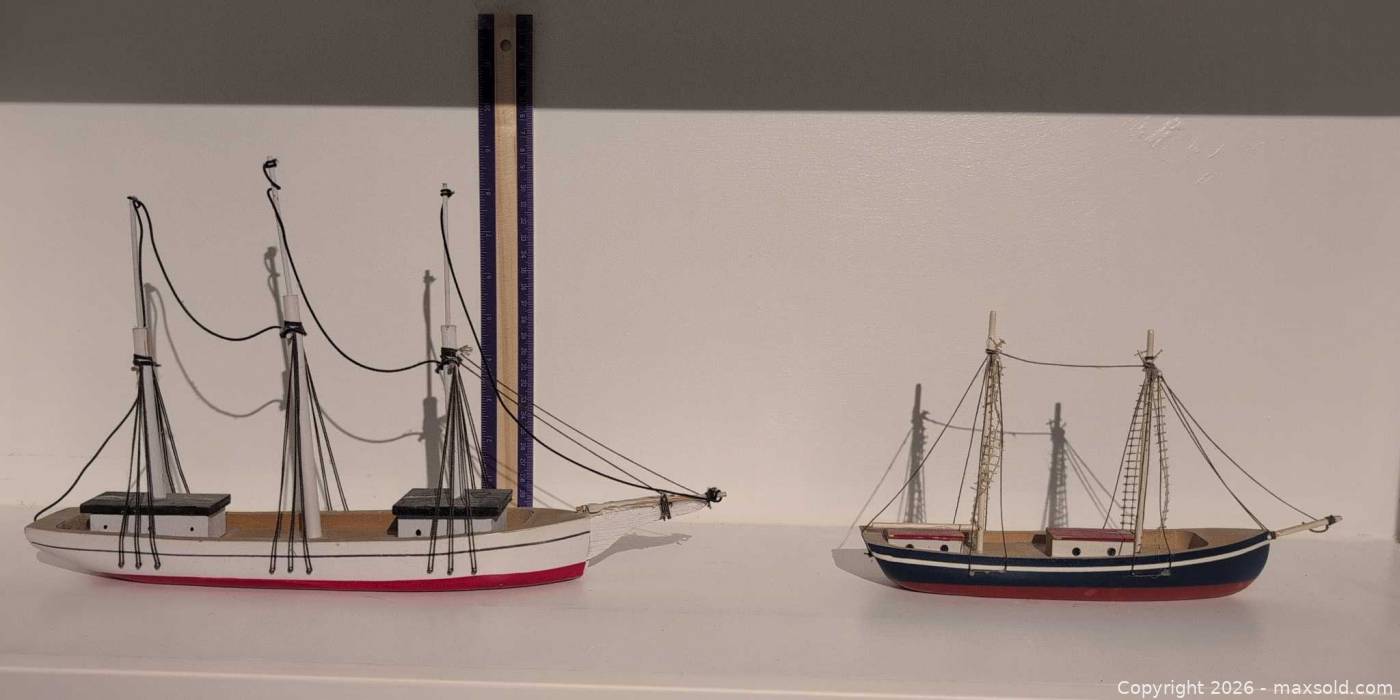 Pair of wooden model boats | Maxsold