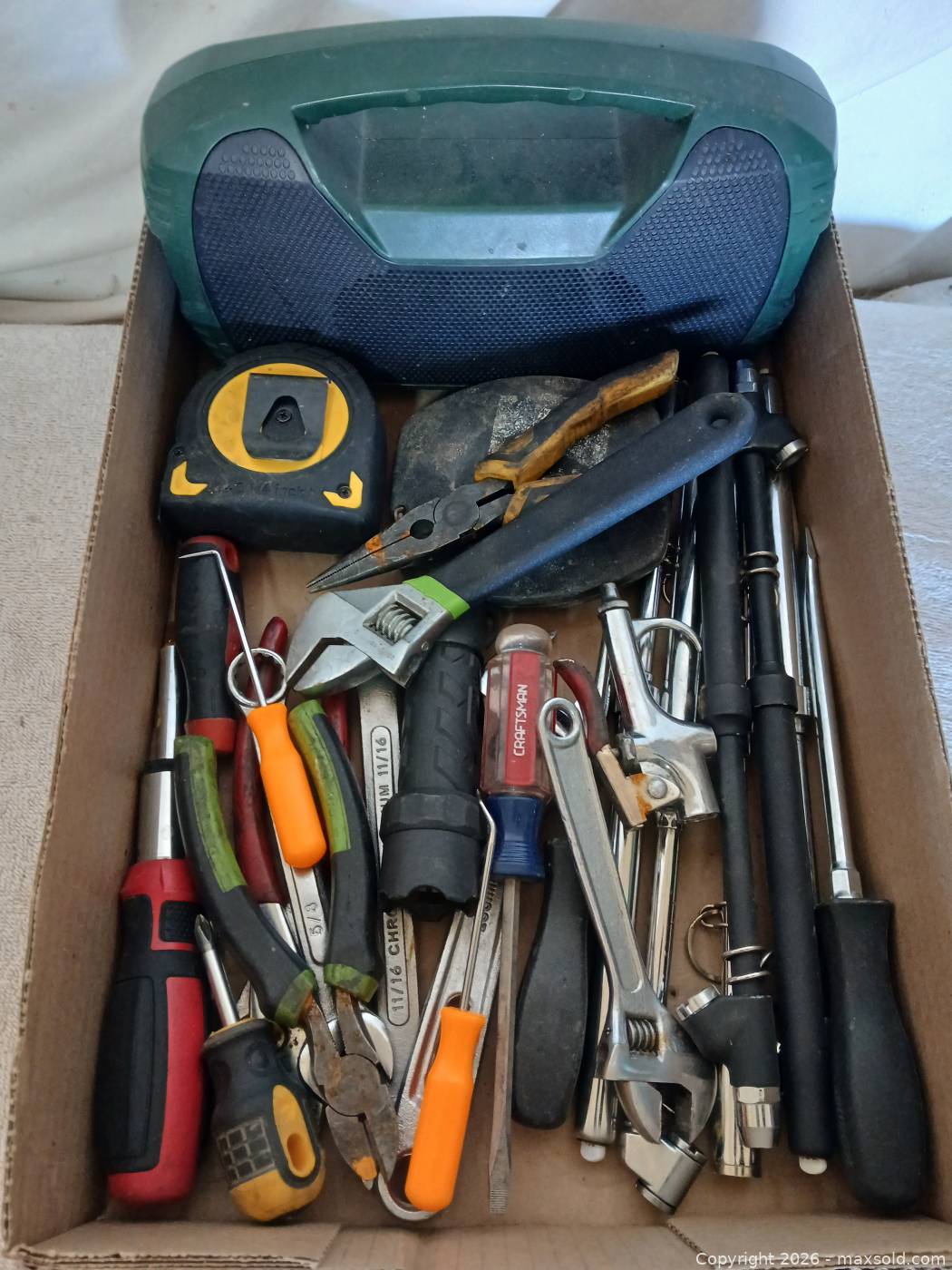 Assorted hand tools and portable boombox | Maxsold