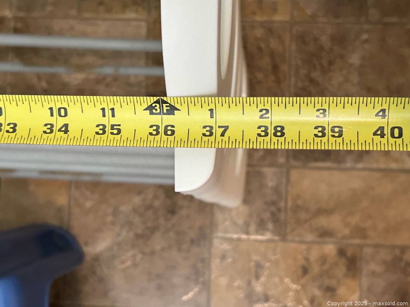 4-tier shoe rack and Rubbermaid step stool | Maxsold