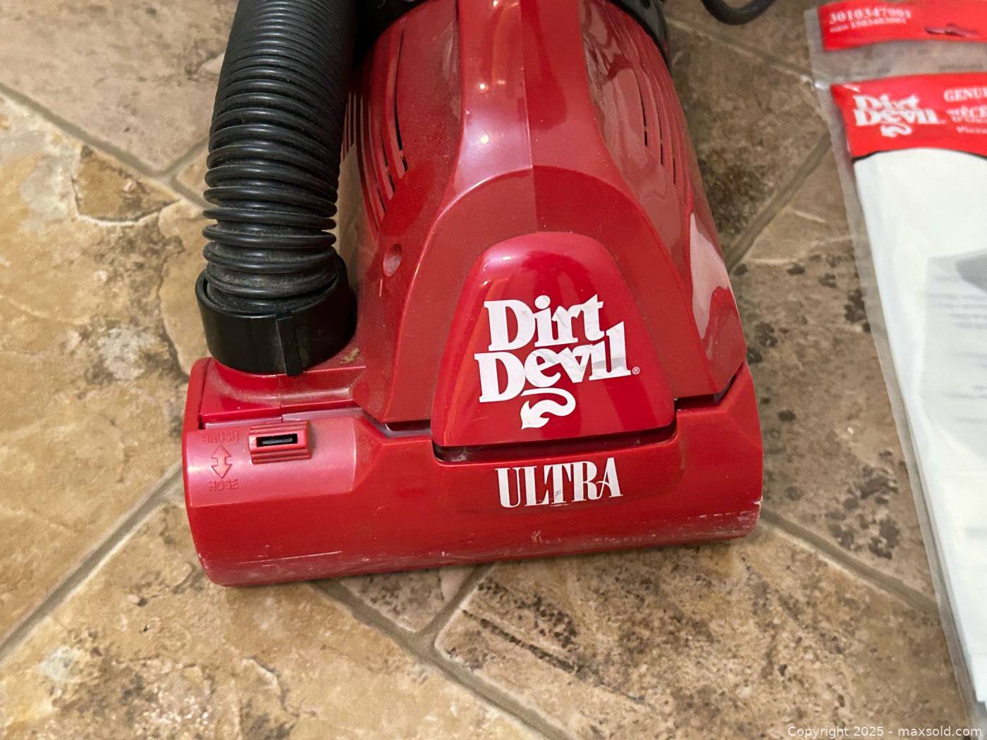 Dirt Devil Ultra handheld vacuum with 2 packs bags | Maxsold