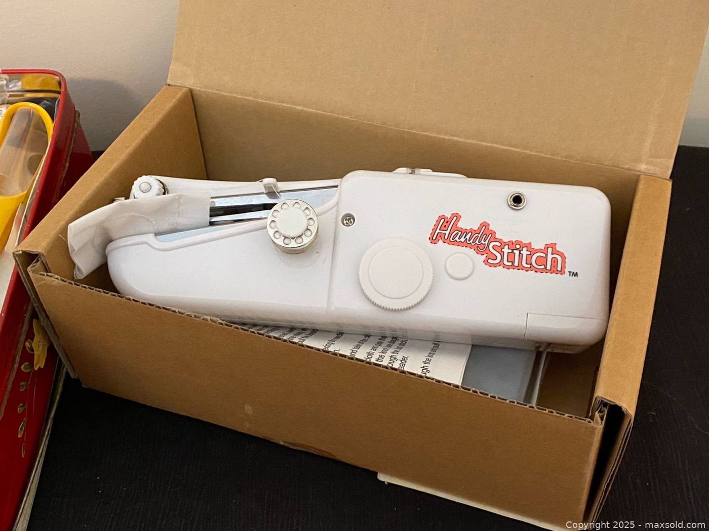 Handy Stitch handheld sewing machine with red metal sewing tin packed ...
