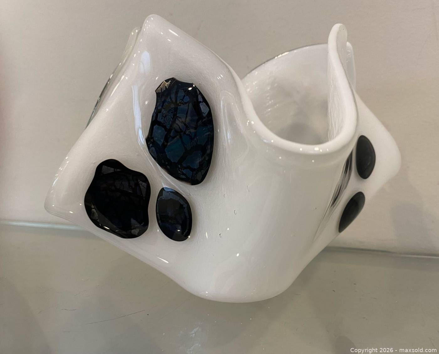 White art glass free-form bowl with dark appliqués | Maxsold