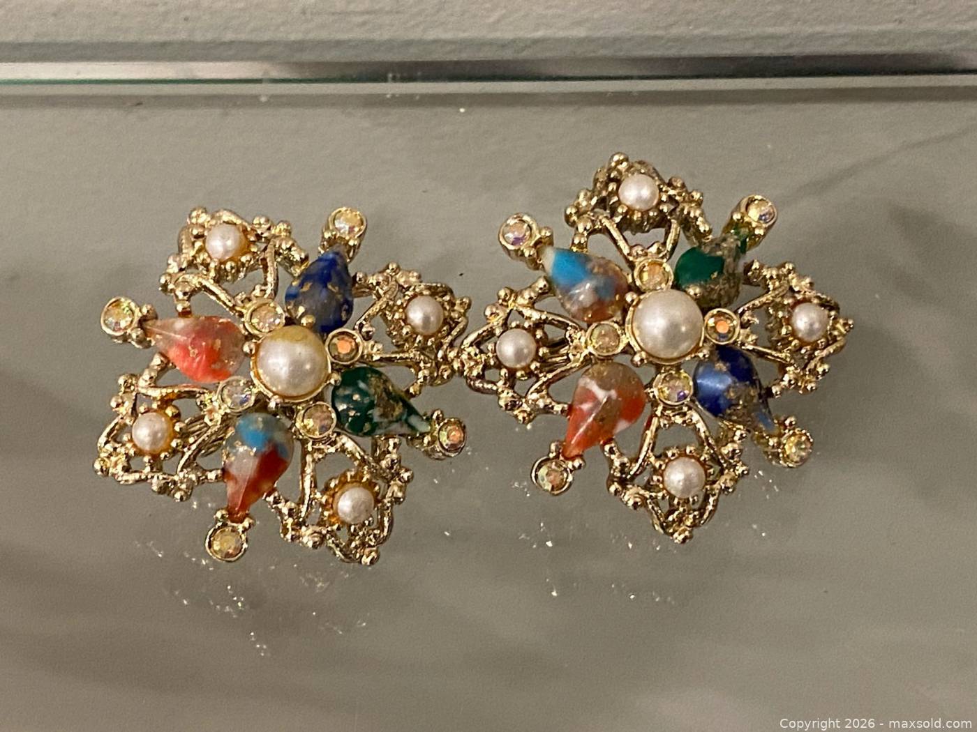 Vintage Sarah Coventry Galaxy gold-tone clip-on earrings | Maxsold