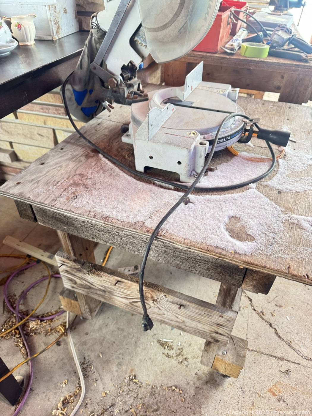 Delta ShopMaster compound miter saw on stand | Maxsold