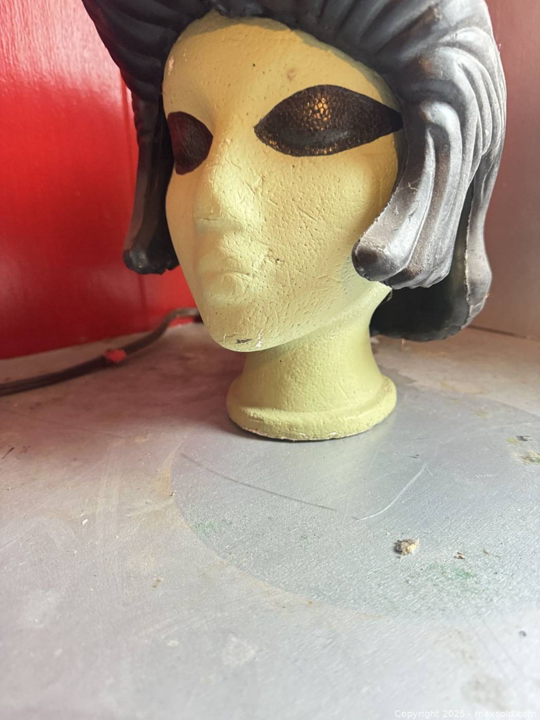 Elvis Presley alien foam head sculpture | Maxsold