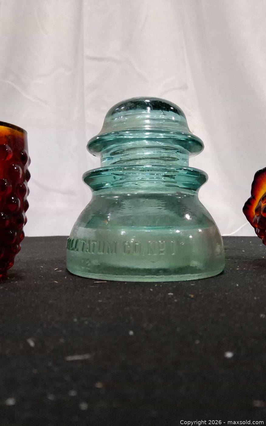 Aqua glass insulator with two amber cranberry hobnail bowls | Maxsold