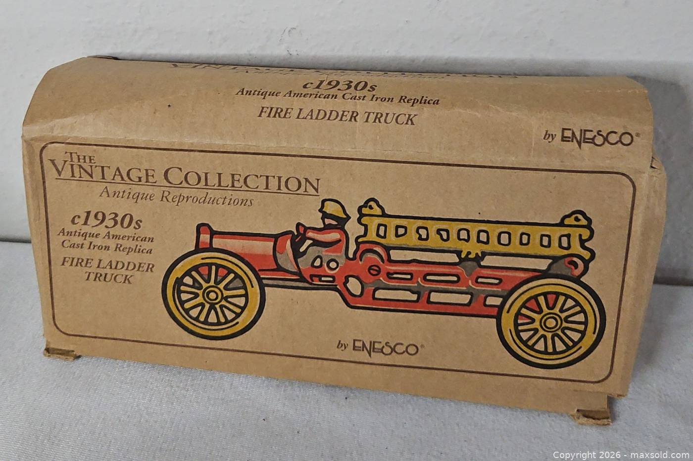 Enesco cast iron fire ladder truck in box | Maxsold