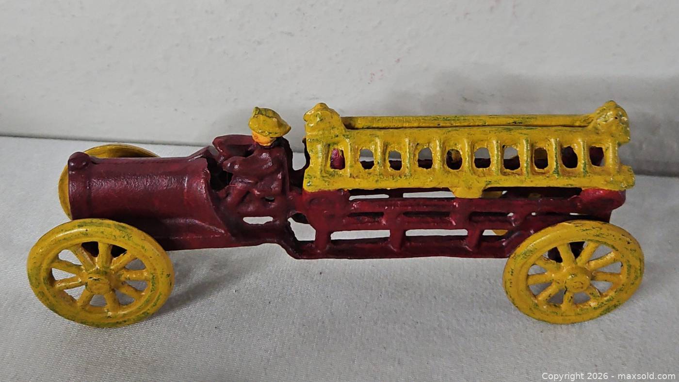 Enesco cast iron fire ladder truck in box | Maxsold