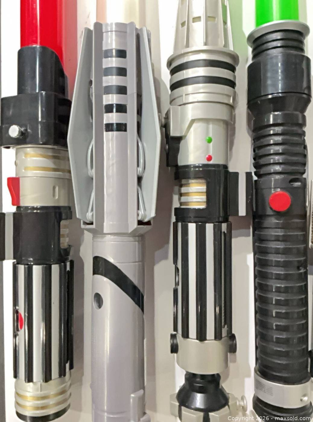 7 Toy Lightsabers Plus Lightsaber Remote | Maxsold