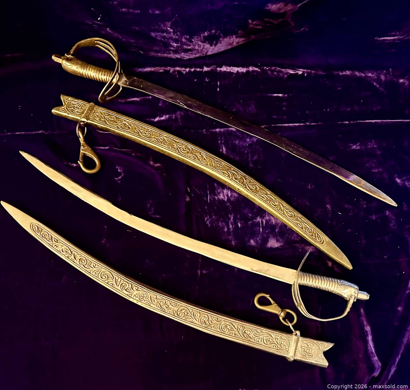 Two ornamental metal sabers with scabbards | Maxsold