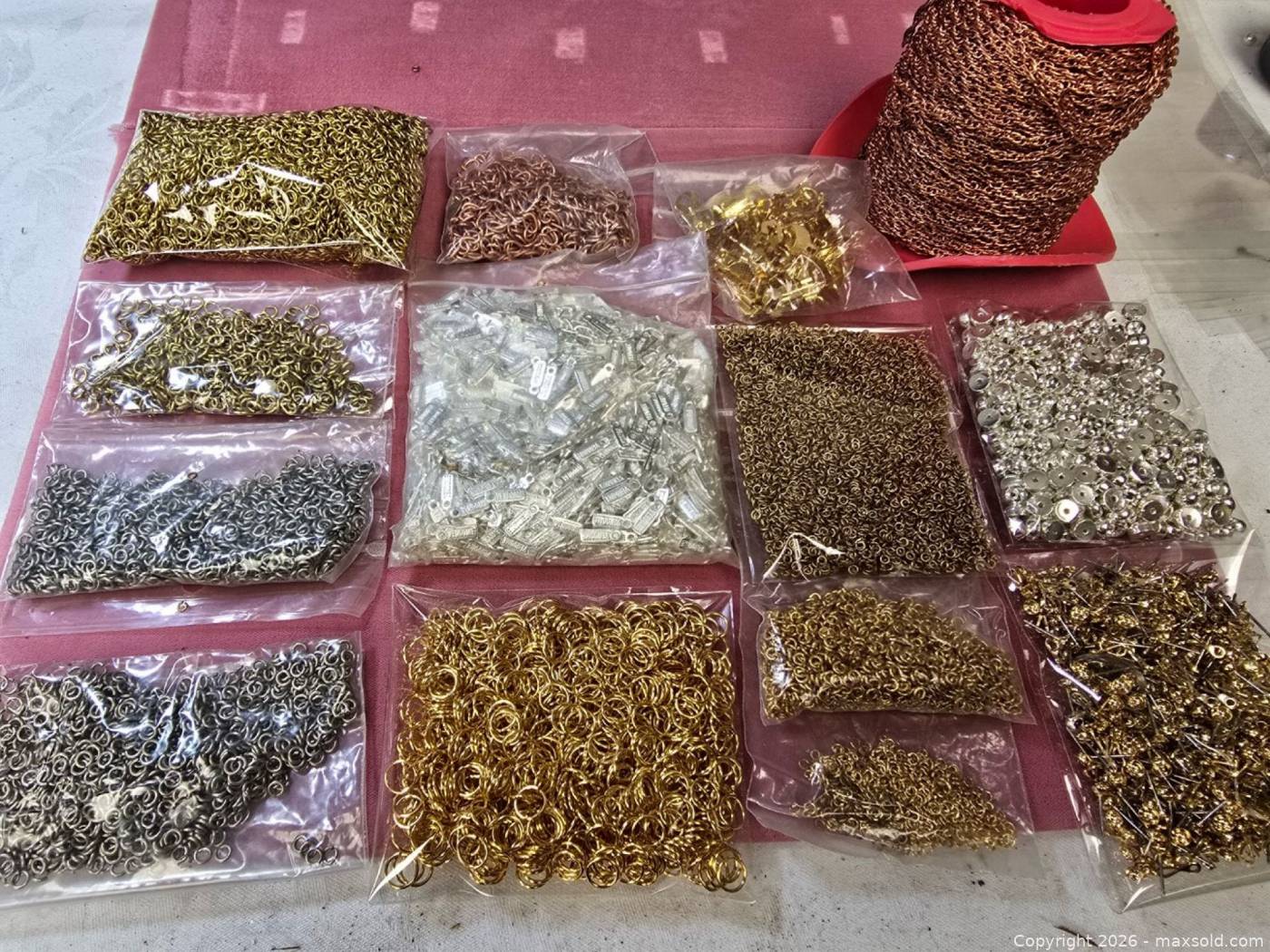Mixed metal jewelry findings and chain spool | Maxsold