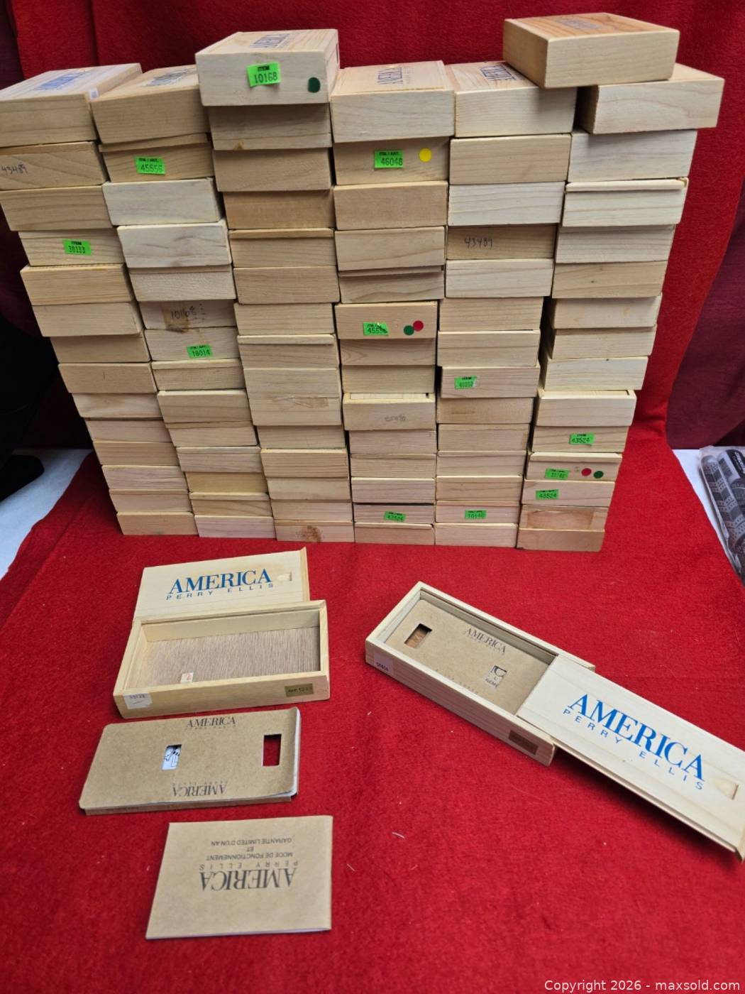 70 Perry Ellis America wooden slide-top boxes | Maxsold