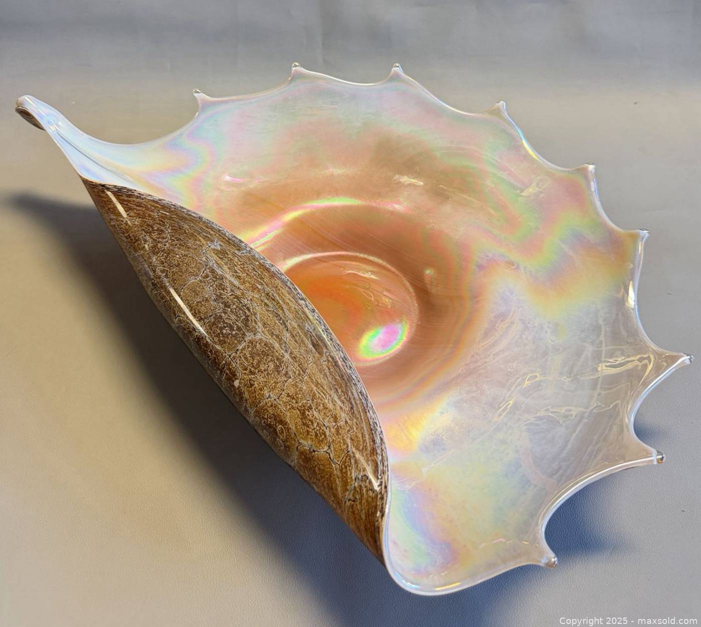 Vintage hand-blown iridescent art glass conch shell centerpiece | Maxsold