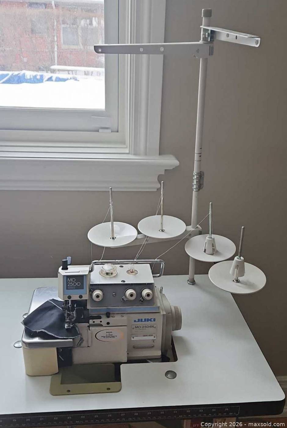 Juki MO-2504N industrial 3-thread serger with stand | Maxsold