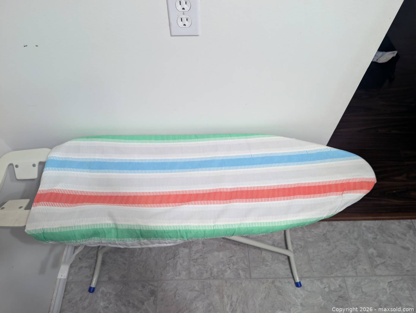 Small folding ironing board with iron rest | Maxsold
