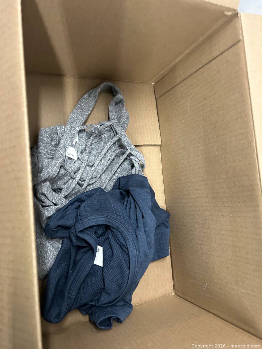 Box of new assorted women’s clothing | Maxsold