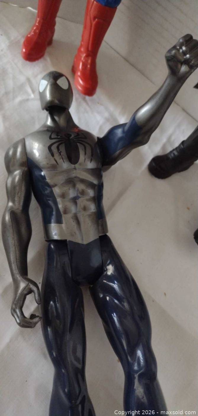 Three 12-inch Action Figures | Maxsold