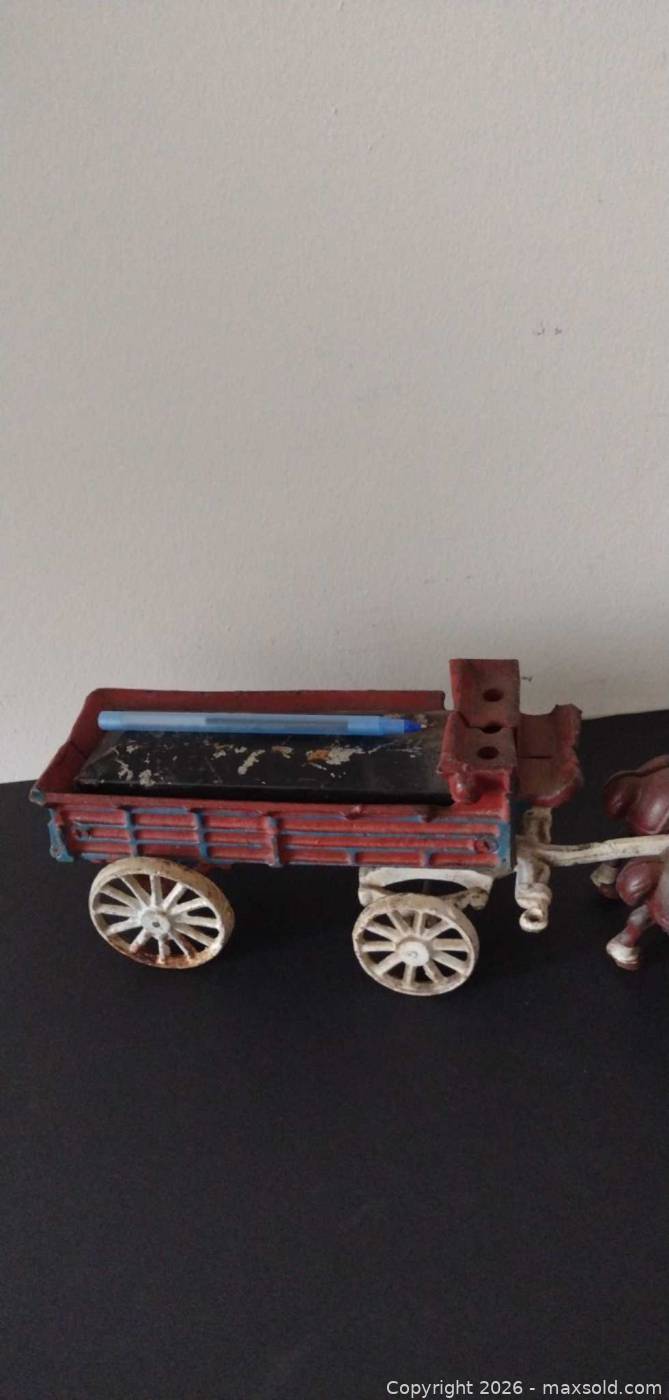Vintage cast iron 8-horse team with wagon | Maxsold