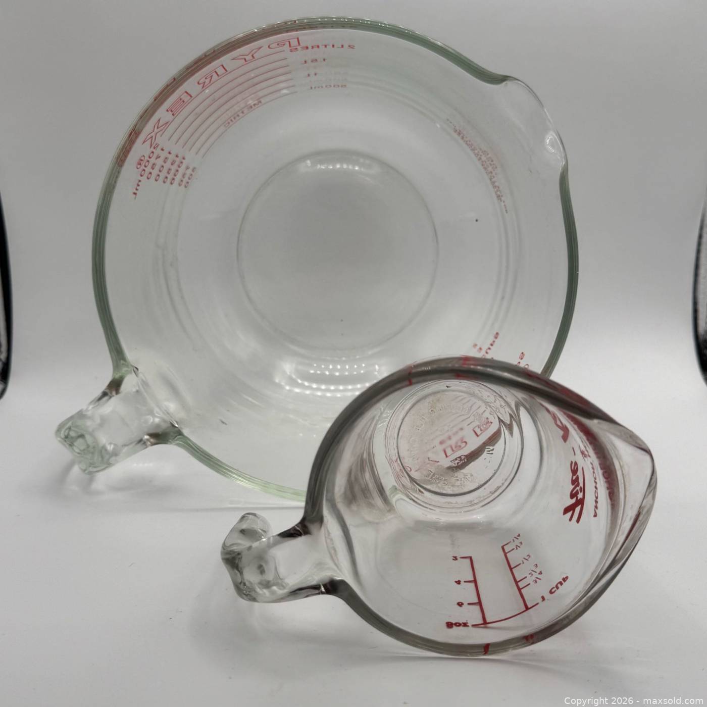 Vintage Pyrex and Fire-King glass measuring cups | Maxsold