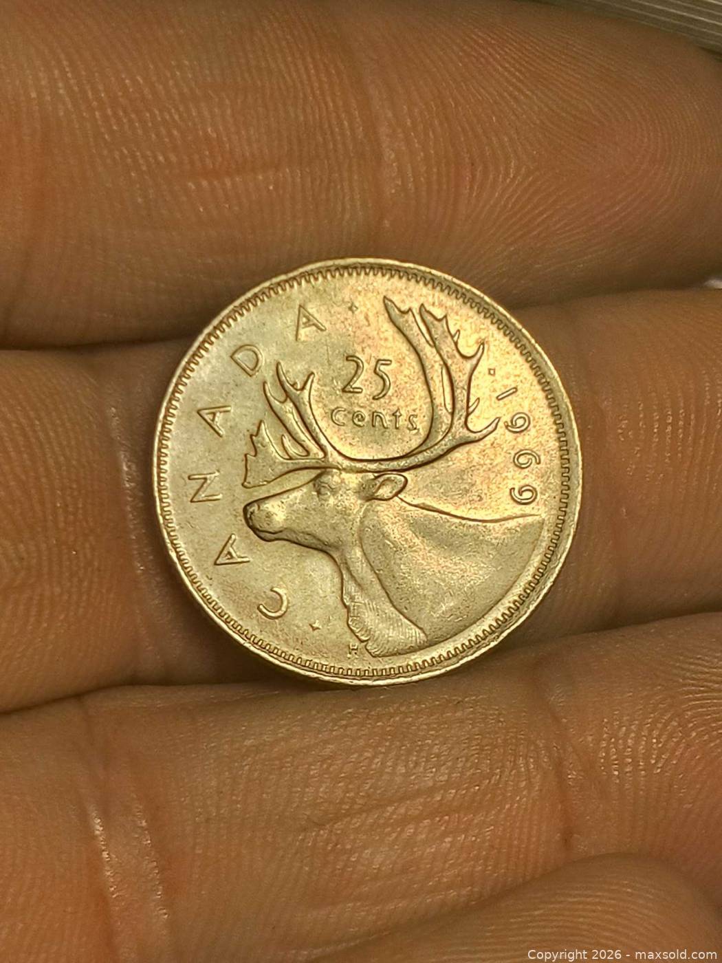 1969 Canadian 25-cent coin | Maxsold