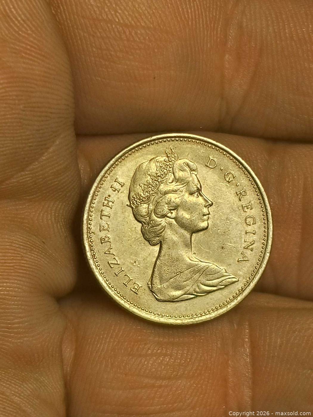1969 Canadian 25-cent coin | Maxsold