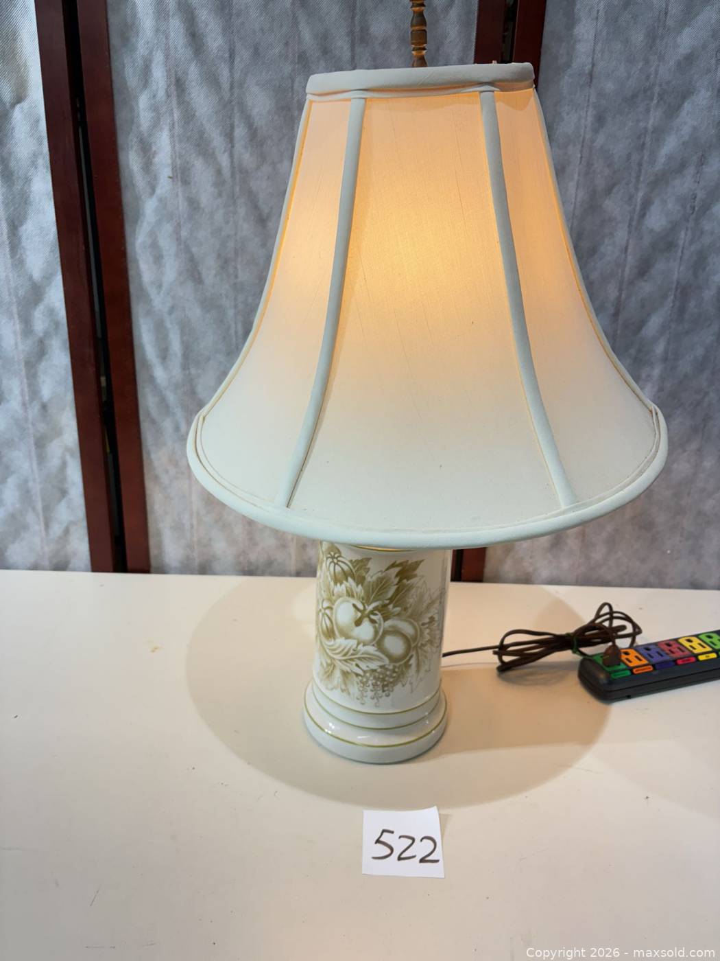 Porcelain table lamp with cream fabric shade | Maxsold