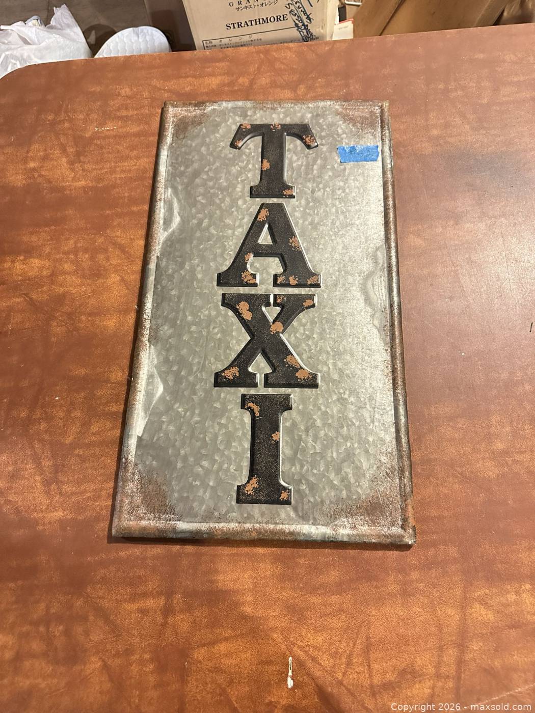 Galvanized metal "TAXI" wall sign | Maxsold