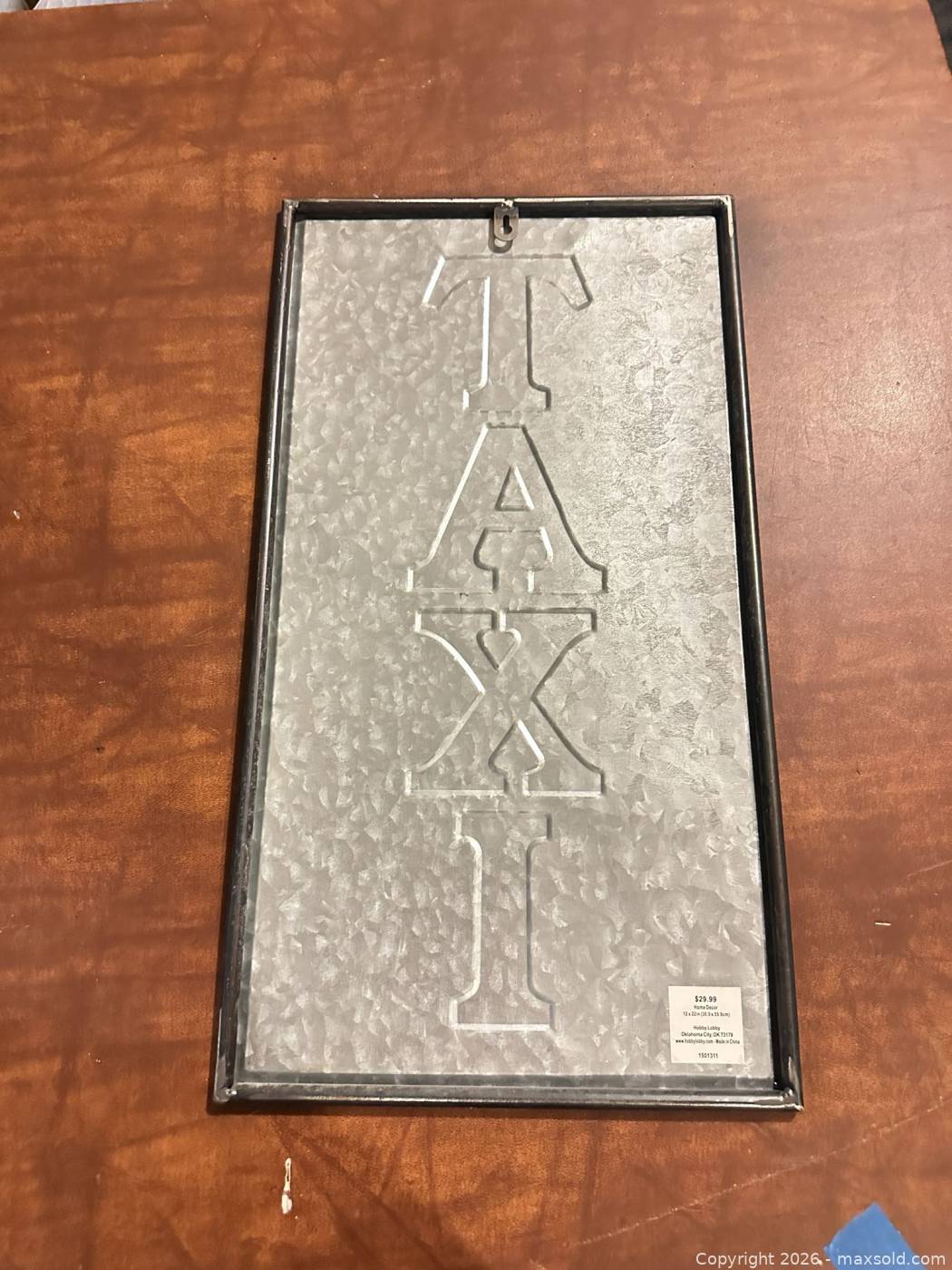 Galvanized metal "TAXI" wall sign | Maxsold