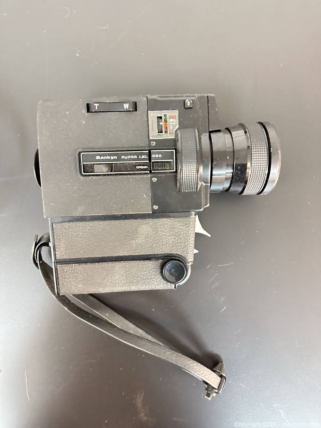 Sankyo Super LXL-250 Super 8 movie camera with case, manual, film | Maxsold