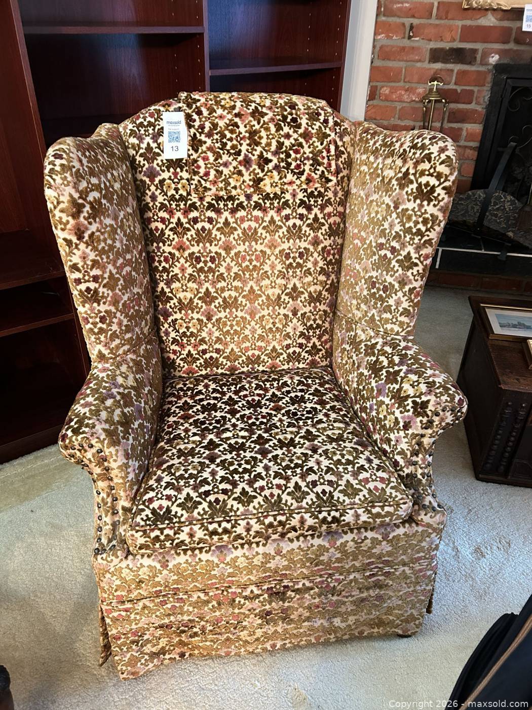 Antique wingback chair | Maxsold