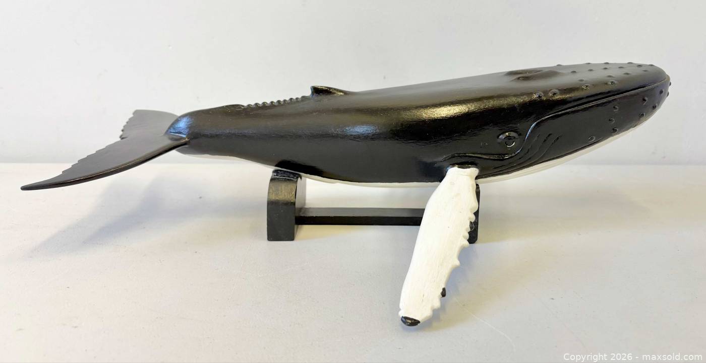 Carved wood humpback whale sculpture on plinth | Maxsold