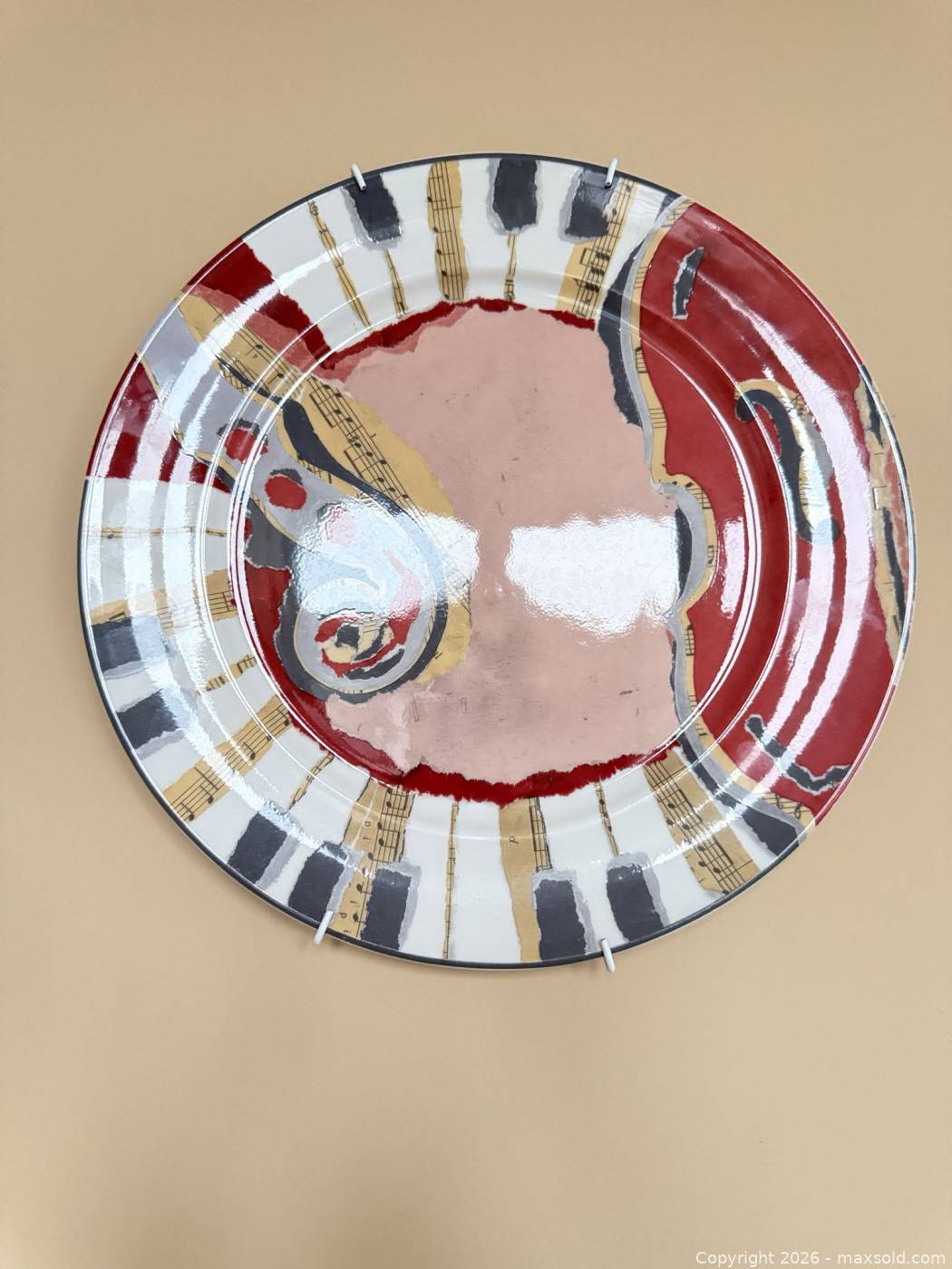 Decorative abstract ceramic wall plate 12 in | Maxsold