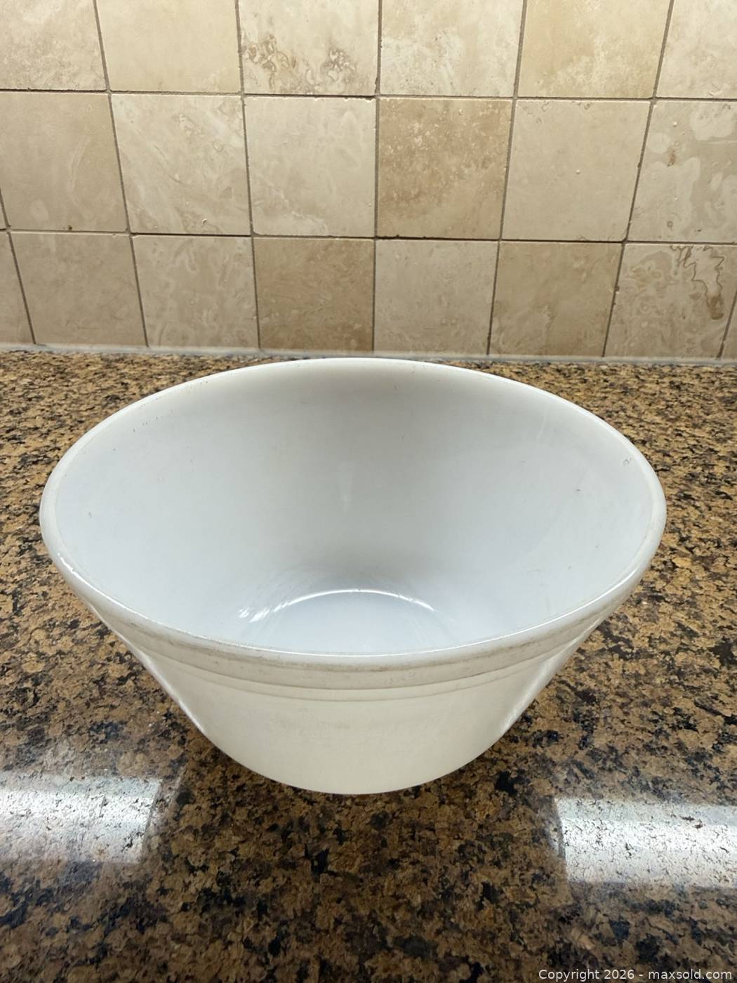 Opaque white milk glass mixing bowl | Maxsold