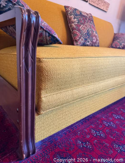 Mid-century mustard yellow convertible sofa bed | Maxsold