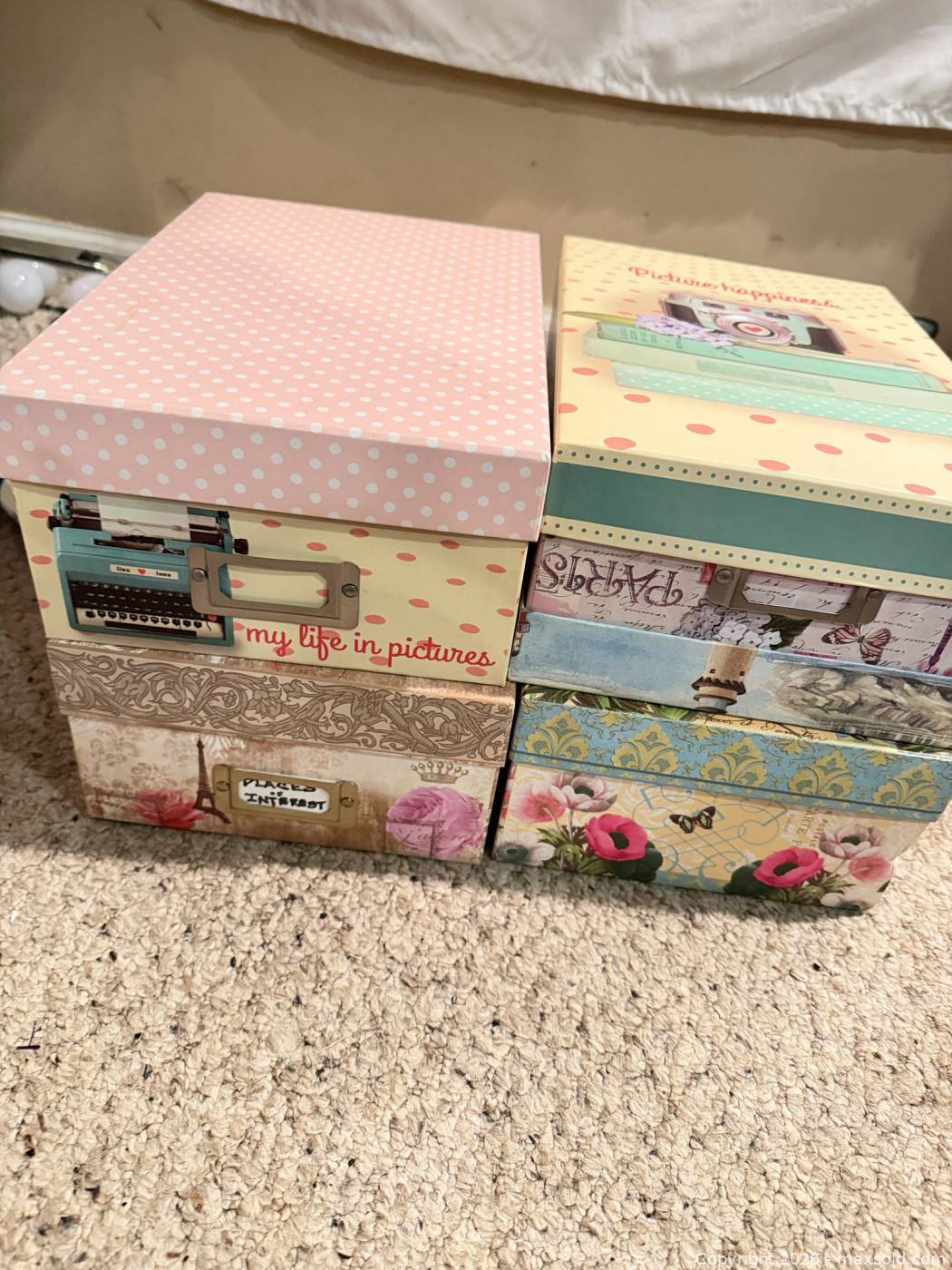 Set of 4 decorative paperboard storage boxes | Maxsold
