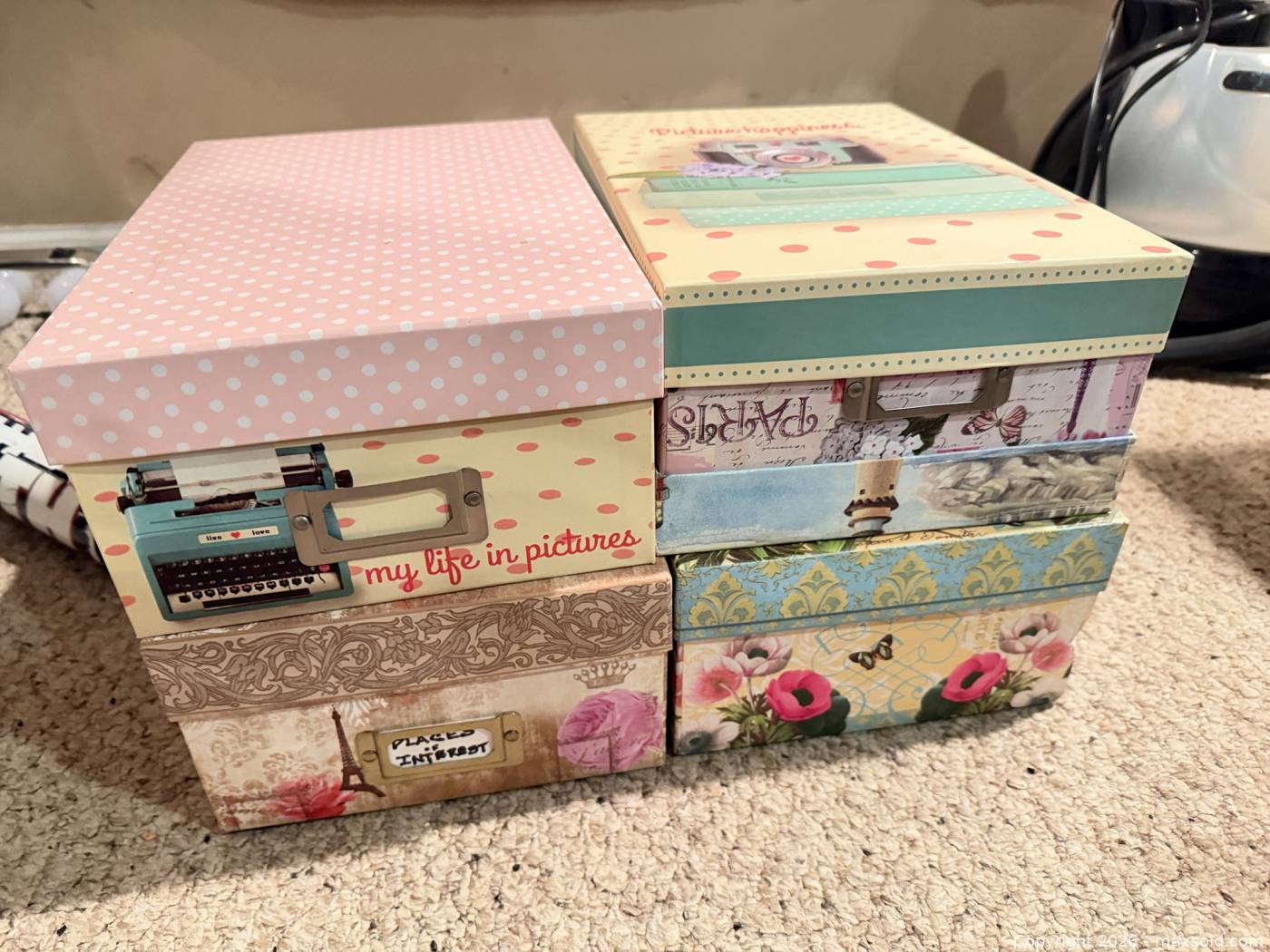 Set of 4 decorative paperboard storage boxes | Maxsold