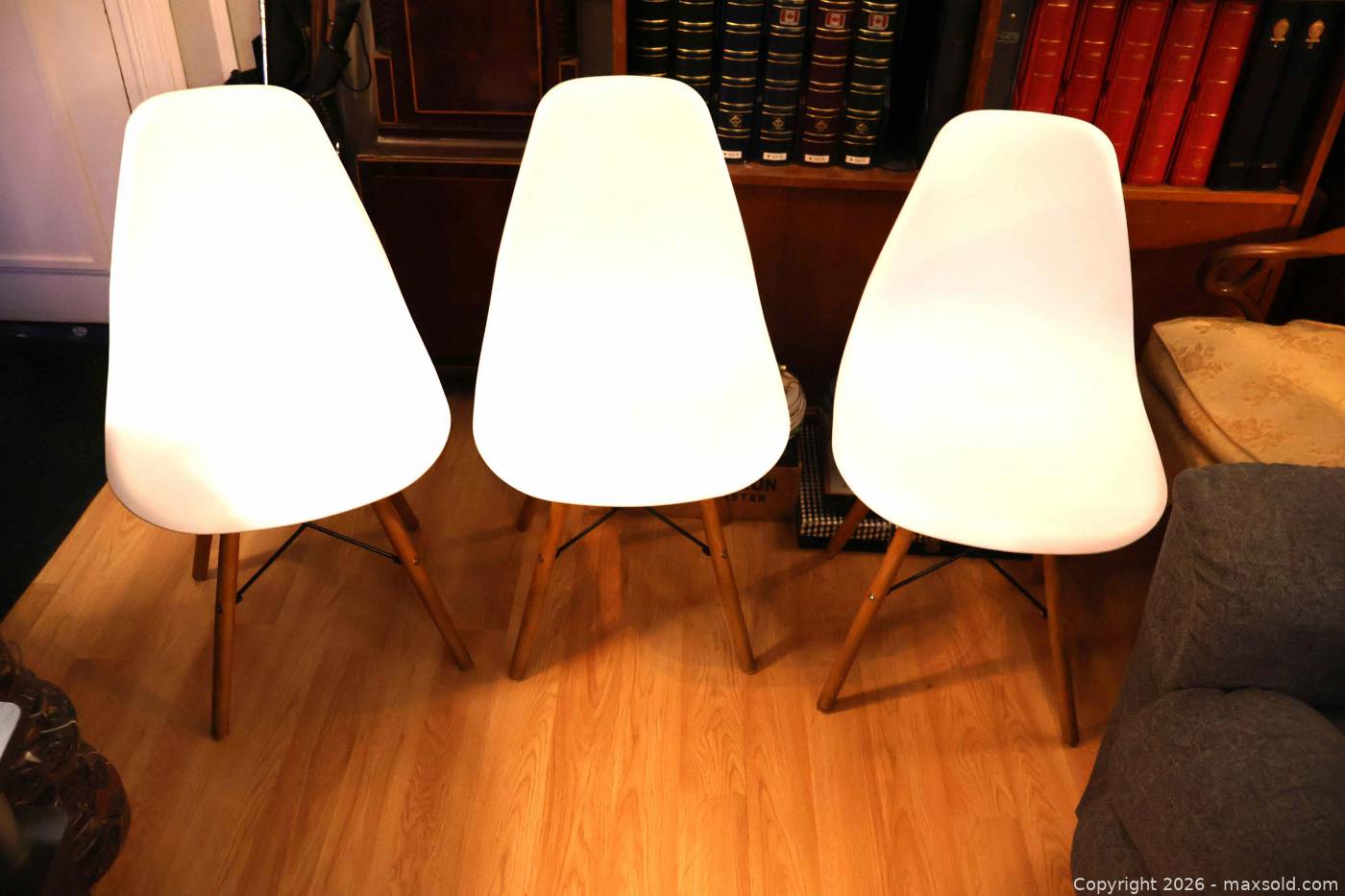 3 Eames style white side chairs | Maxsold