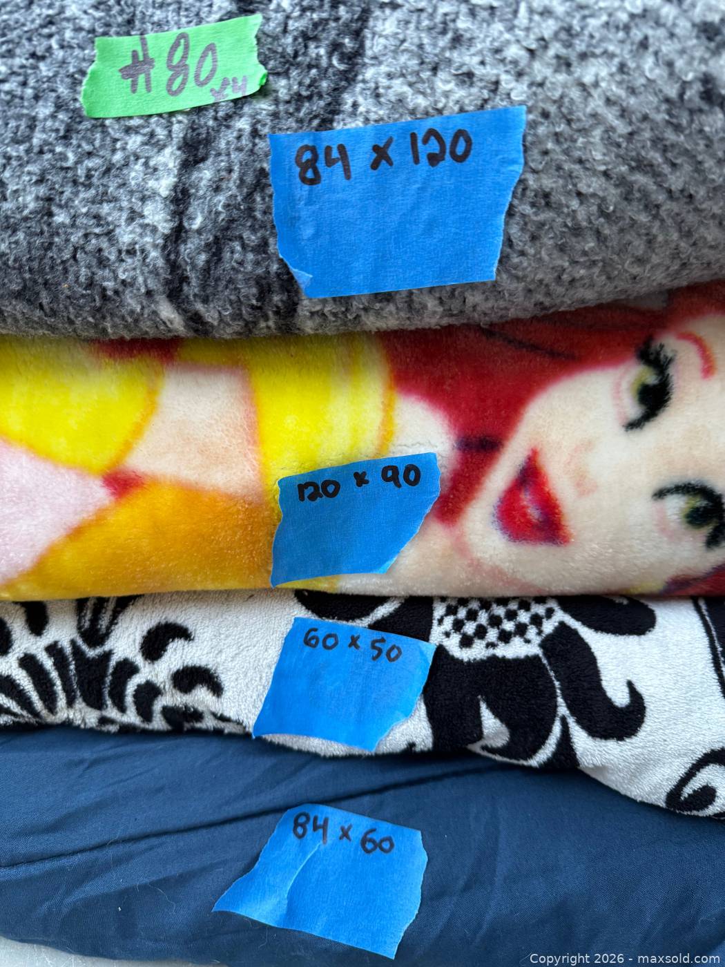 Lot of 4 assorted blankets | Maxsold