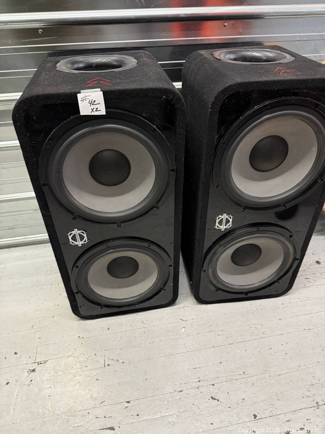 Pair Bassworx dual-woofer speaker cabinets | Maxsold