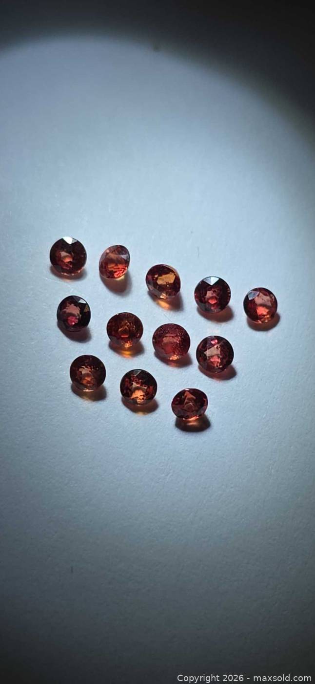 1.19ct natural round pink-orange sapphires | Maxsold