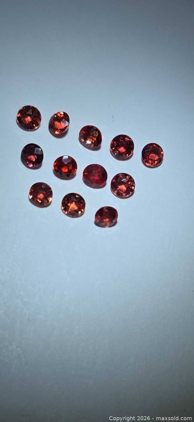 1.19ct natural round pink-orange sapphires | Maxsold
