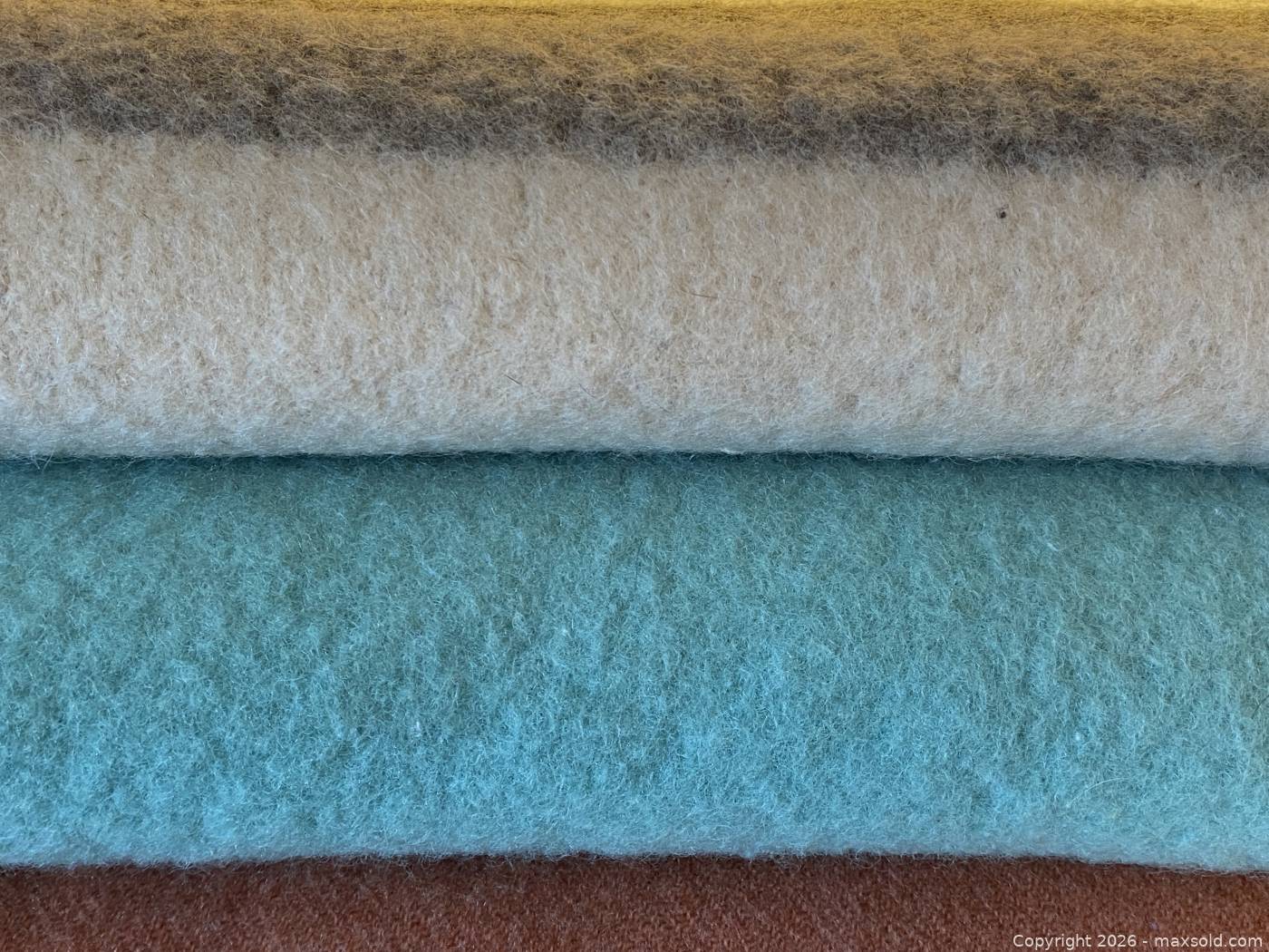 Four 100% wool blankets assorted sizes | Maxsold