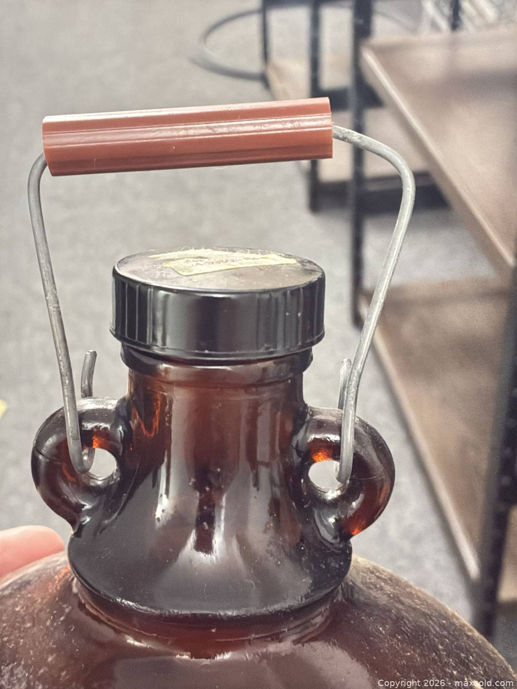 Amber glass carboy jugs with caps and handles | Maxsold