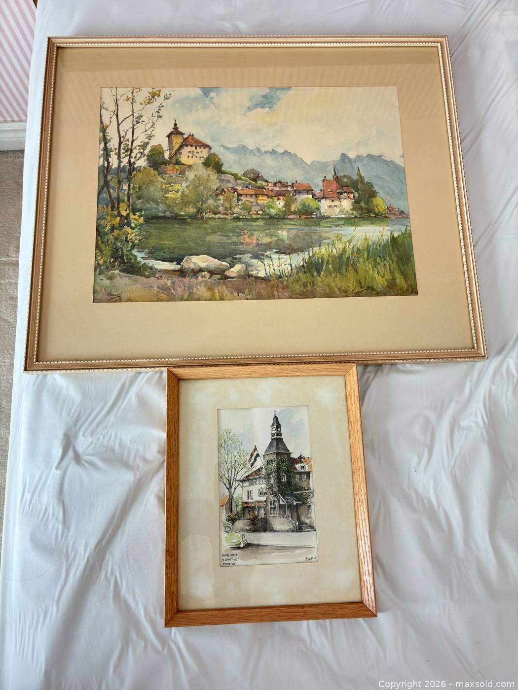 Two framed watercolor & ink European village artworks | Maxsold