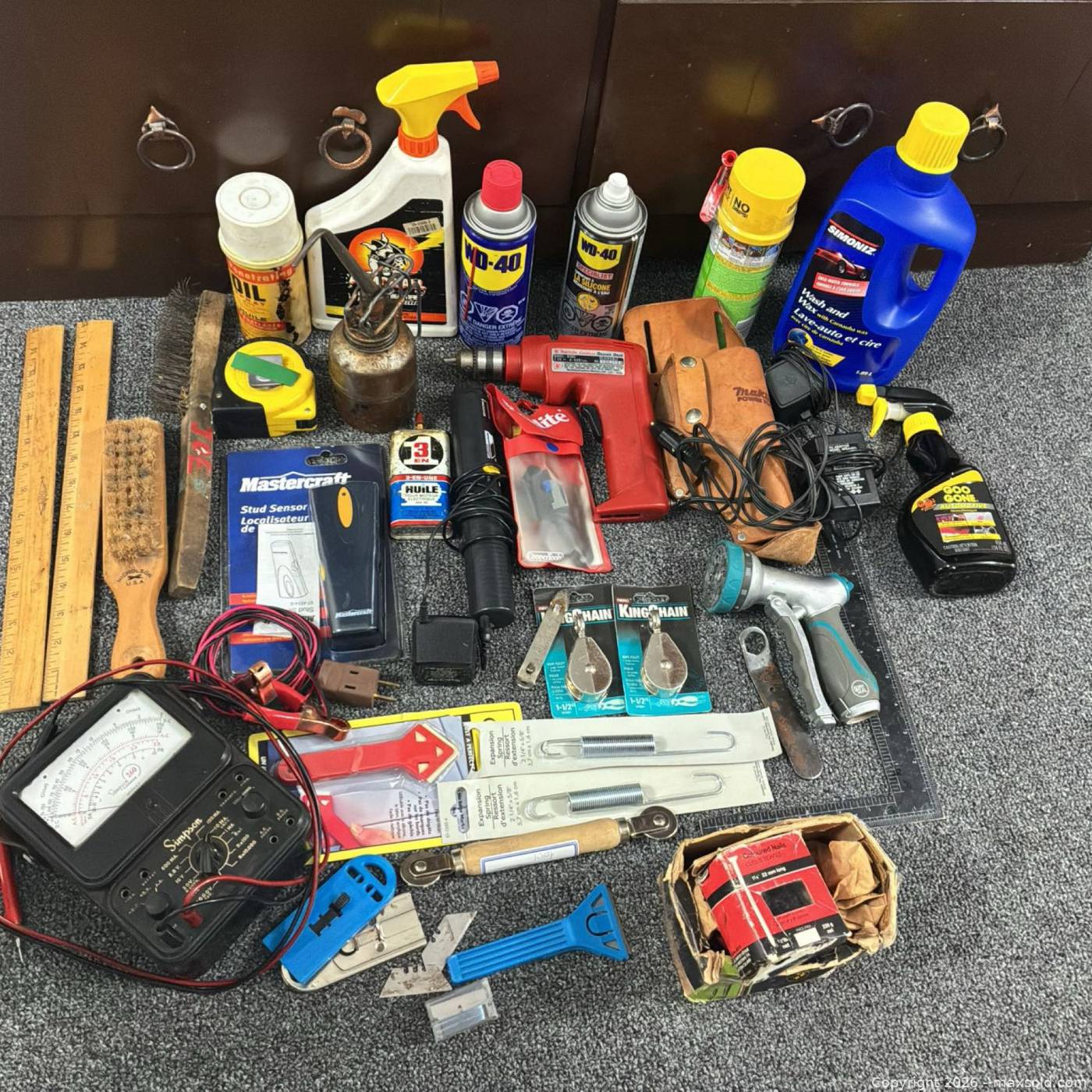 Assorted hand tools, Makita drill, multimeter, lubricants | Maxsold