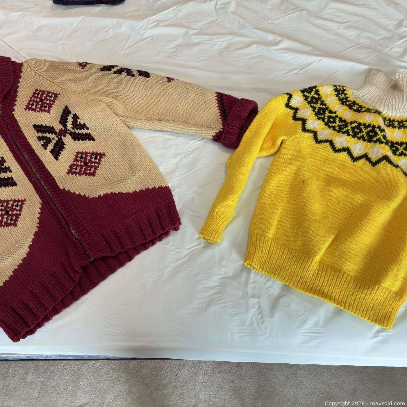 Two wool blend sweaters | Maxsold