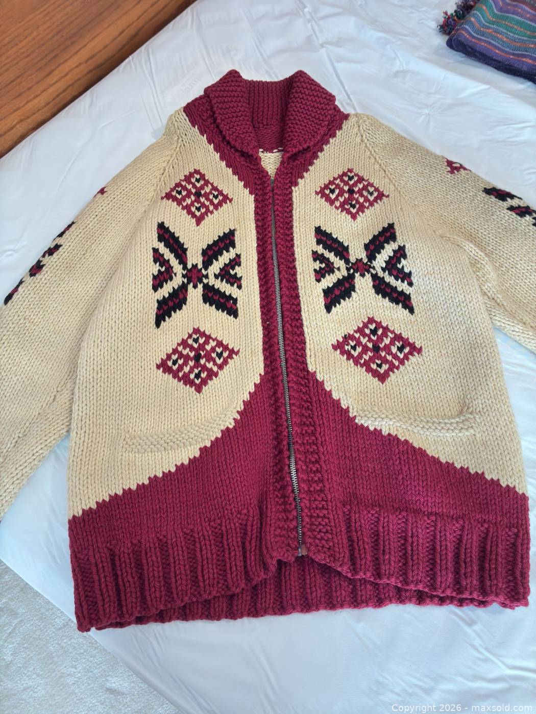 Two wool blend sweaters | Maxsold